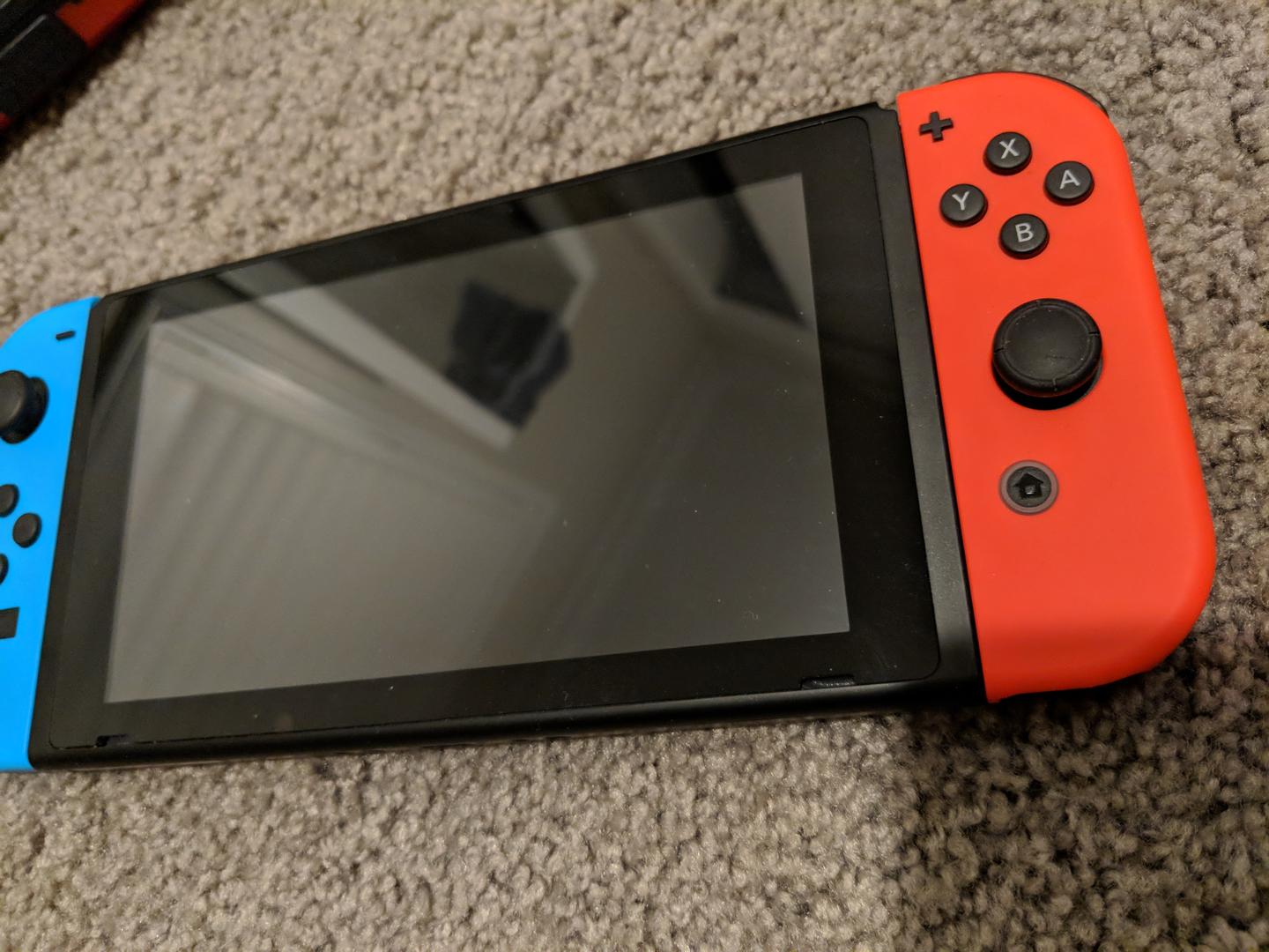 Nintendo Switch - Red & Blue, 32GB - LRCJ79087 - Swappa