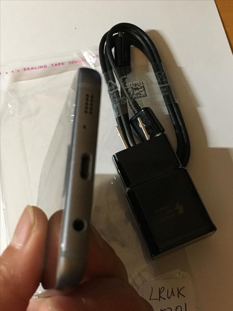 Samsung Galaxy S7 - Unlocked, Black, 32GB, SM-G930W8 - LRUK05201 - Swappa